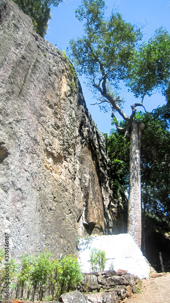 Buddha carved on mountain rock cliff “ The large unfinished Buddha ...