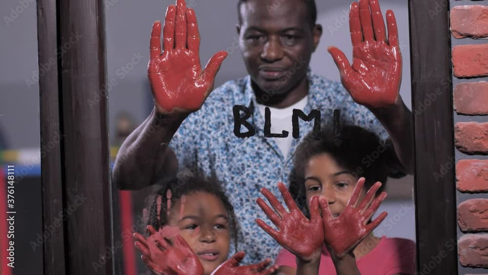 Mixed race family of african american father and preteen daughters ...