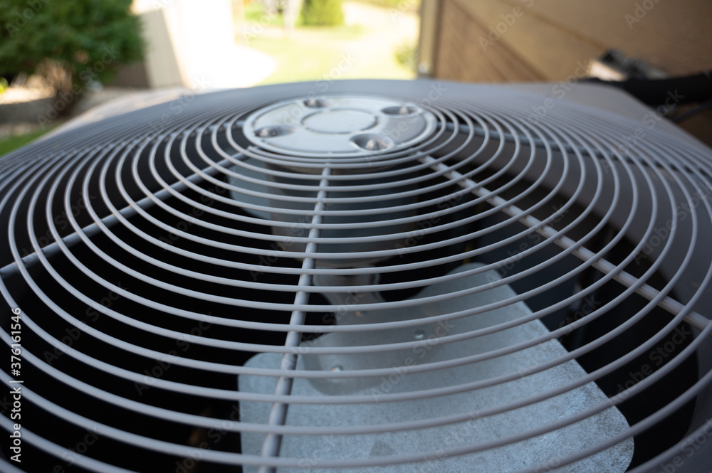 Top view of Residential air conditioning unit outdoors with fan and ...