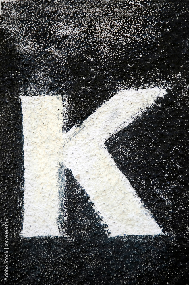 Old, faded, worn and used letters, alpha numeric set character that ...