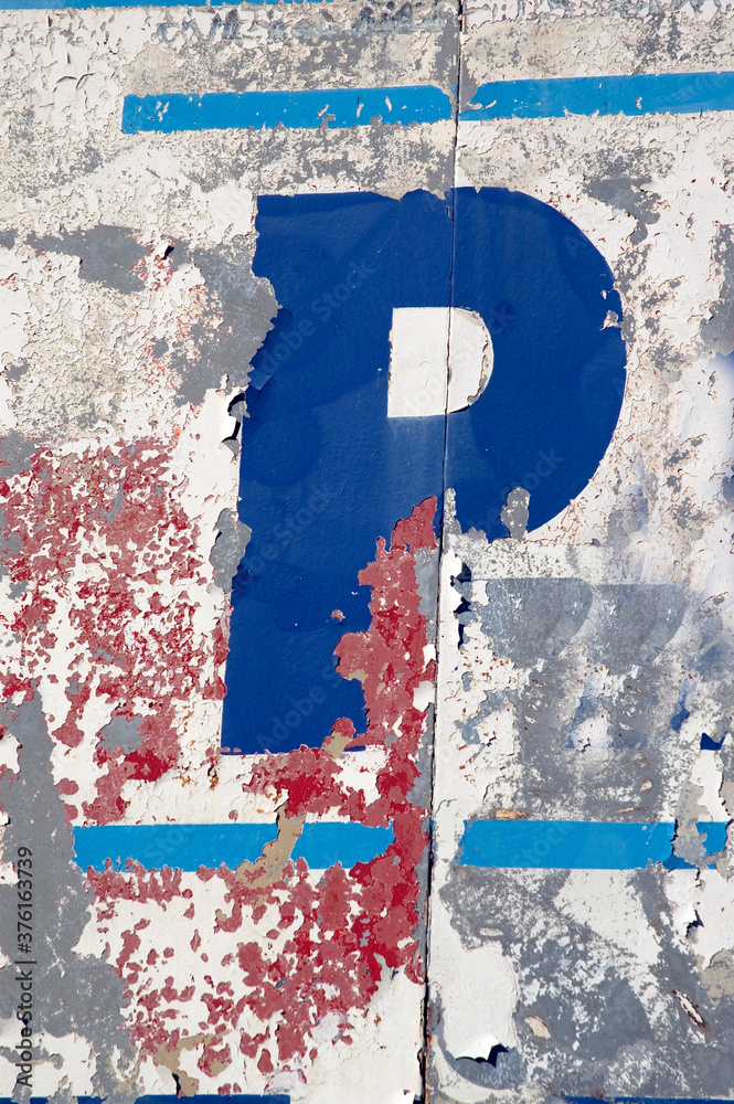 Old, faded, worn and used letters, alpha numeric set character that ...