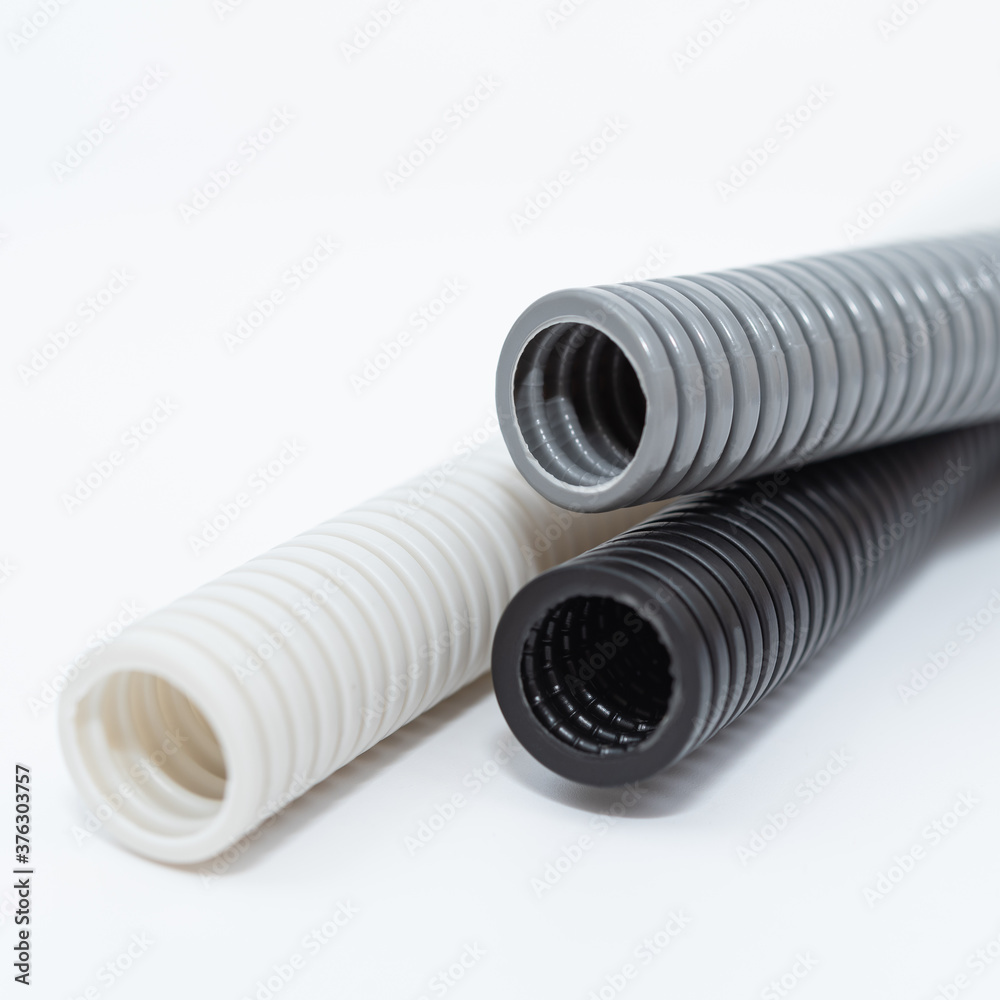 PVC flexible electrical conduit isolated on white background. Plastic ...