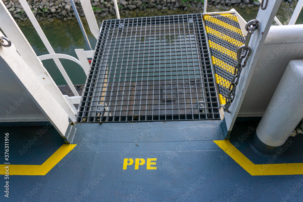 Safety walkway on ships deck. Yellow line walkway. Guided walkway on ...