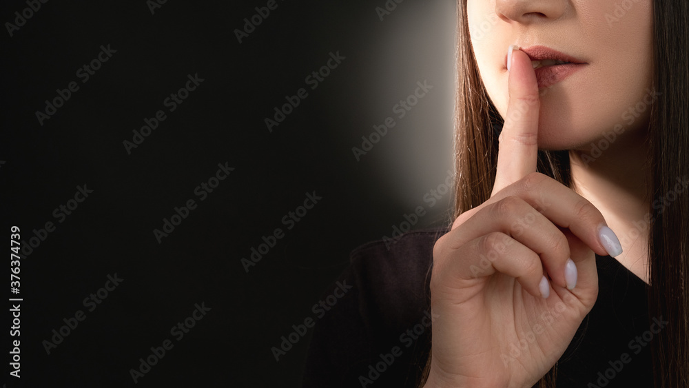 Shush gesture. Domestic violence. Secret woman showing shhh with finger ...