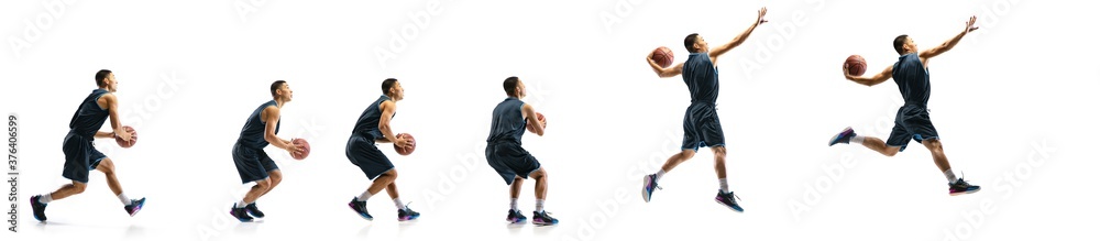 Attacking. Young basketball player of team training in action, motion ...