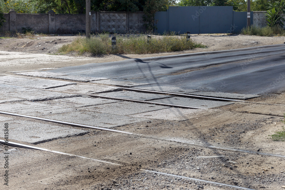 Damaged road, damaged chopped asphalt with potholes and spot. Very bad ...