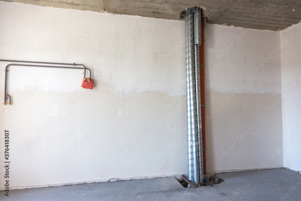 Construction of an apartment in a new house. Pipelines in the new house ...