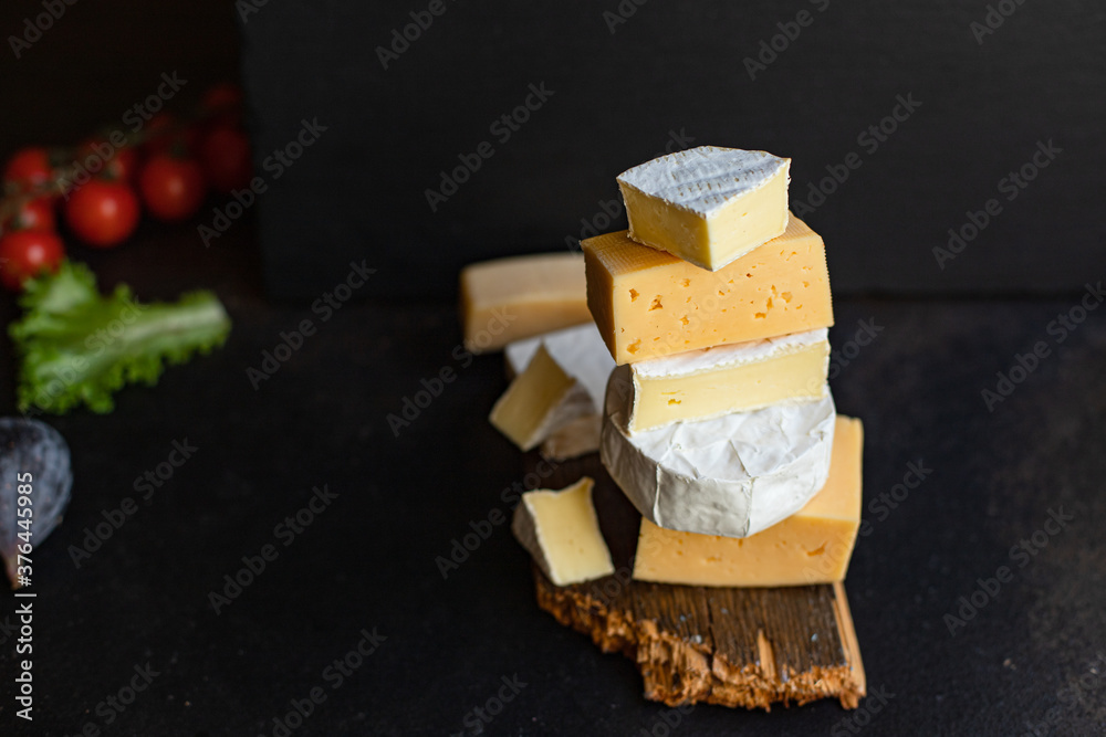 cheese assortment different types of hard and soft cheeses serving size ...