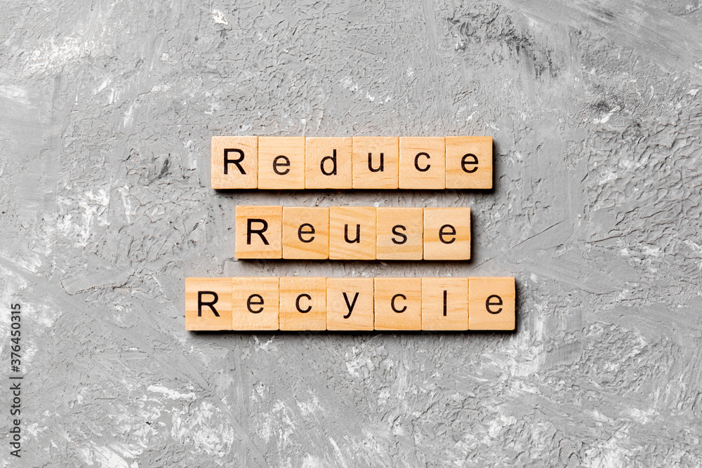 reduce, reuse and recycle word written on wood block. reduce, reuse and ...