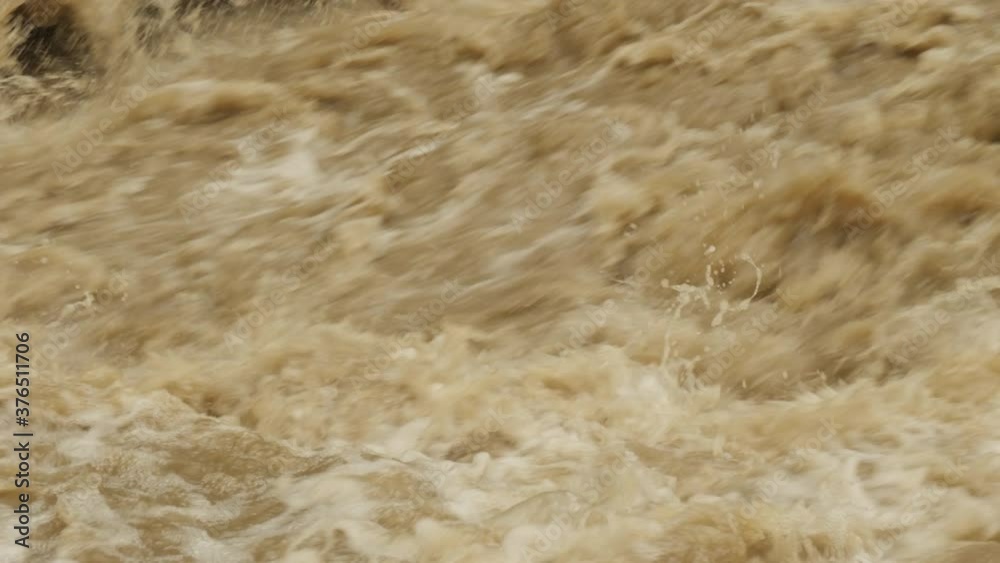 Disaster flood deluge and water flow after rainfall. Raging river with ...