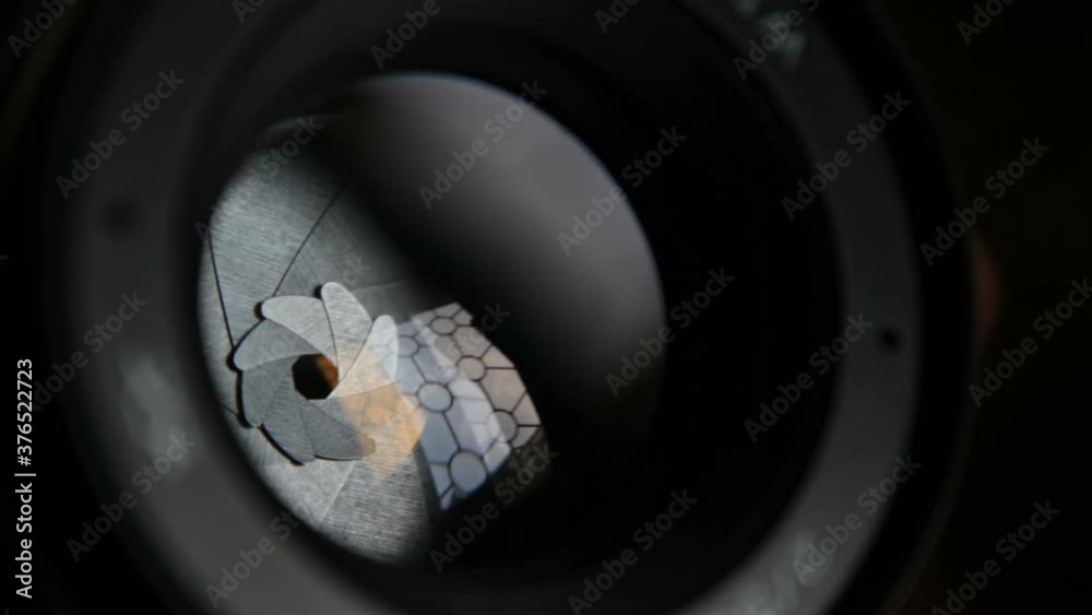 Aperture photo lens close-up. Multi-colored reflections of the window ...
