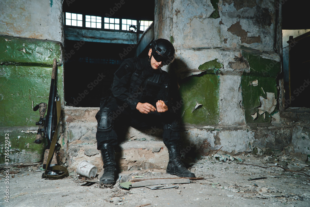 Portrait of special forces soldier reloading his pistol. Stock Photo ...