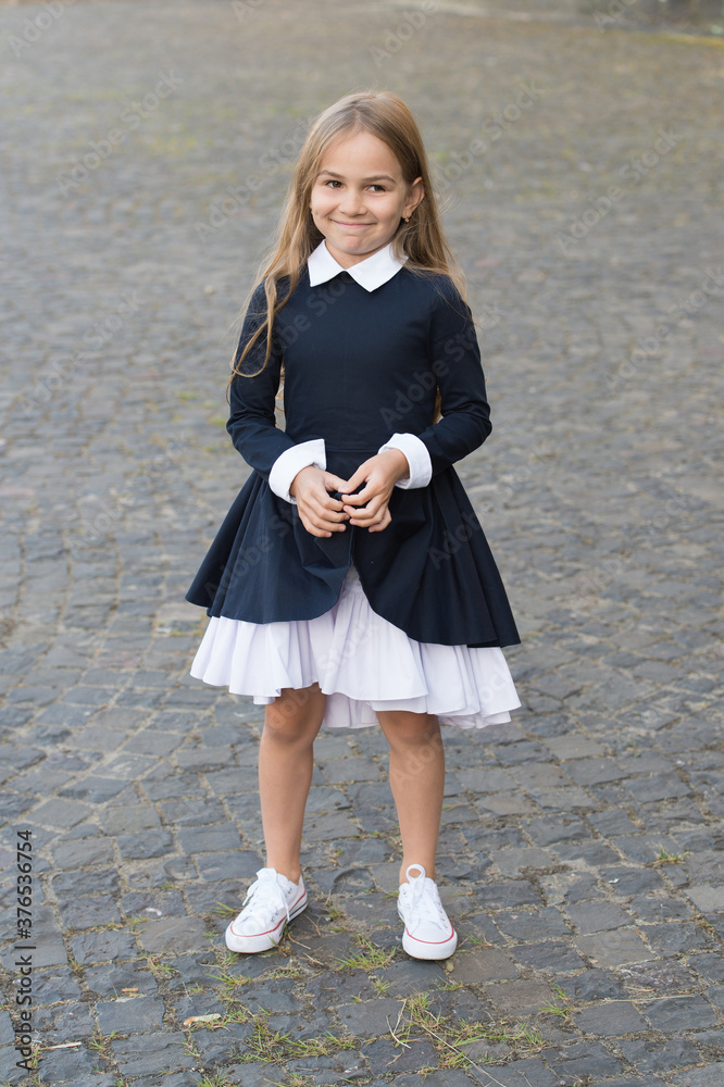 Find your inner diva. Happy child wear uniform outdoors. Fashion look ...