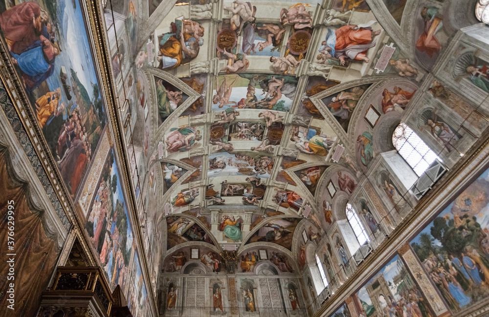 Interior of the Sistine Chapel painted by Michelangelo in Vatican City ...