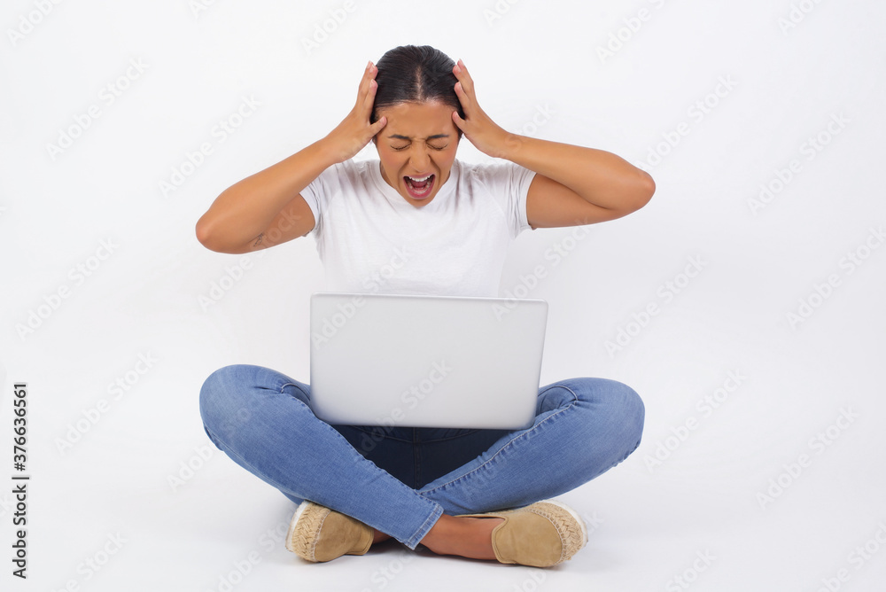 Shocked panic Caucasian girl dressed in stylish clothing holding hands ...