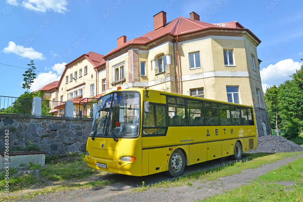 KALININGRAD REGION, RUSSIA. A school bus stands in front of a secondary ...