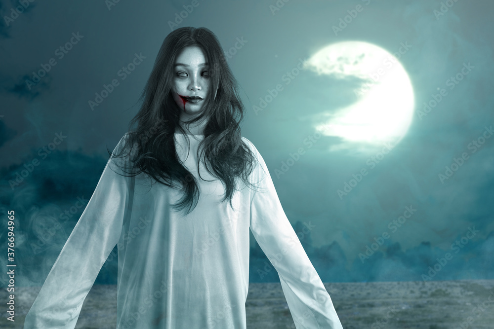 Scary ghost woman standing with night scene background Stock Photo ...