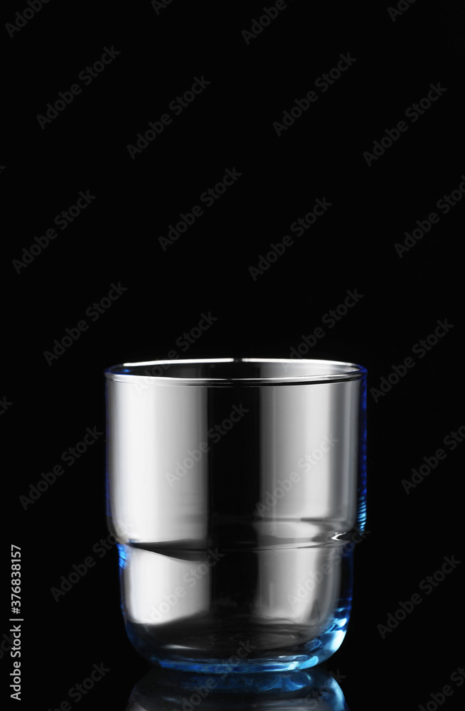 Empty glass on dark background Stock Photo | Adobe Stock