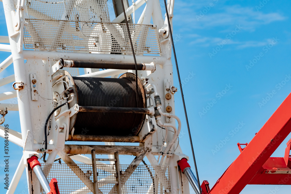 Selective focus on crawler crane with wire rope sling on crane reel ...