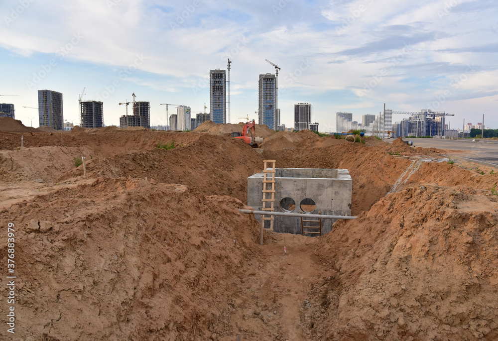 Trench for laying sewer pipes an external sewage system at a ...
