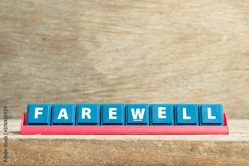 Tile letter on red rack in word farewell on wood background Stock Photo ...