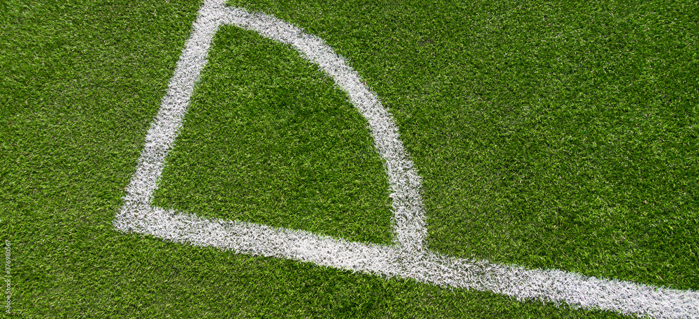 Green artificial grass turf soccer football field background with white ...