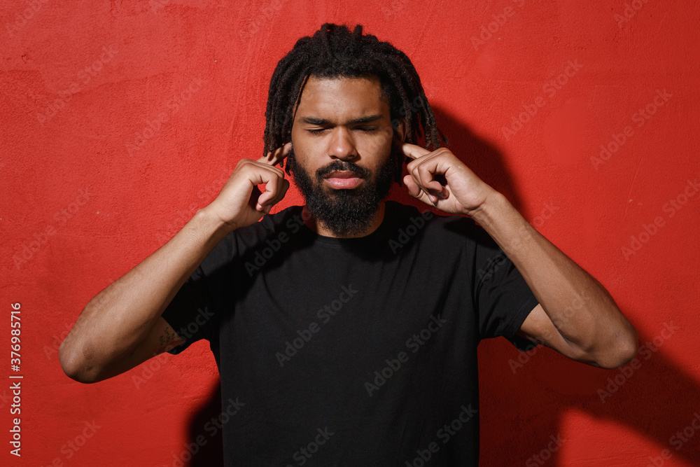 Tired young african american man guy with dreadlocks 20s wearing black ...