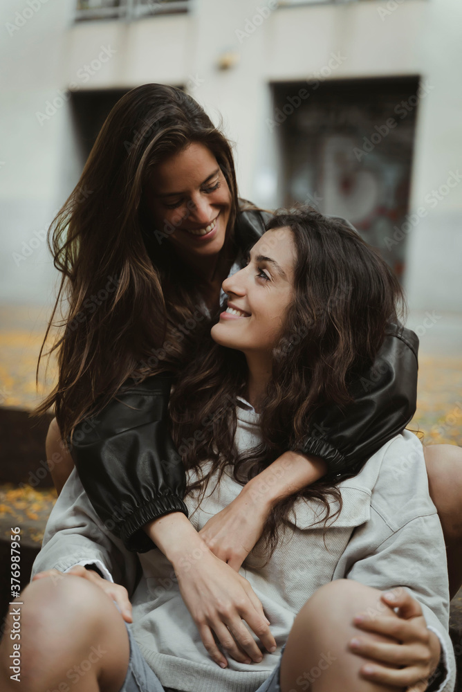 Lesbian Couple Girls Hug Each Other And Look Each Other In The Eye L