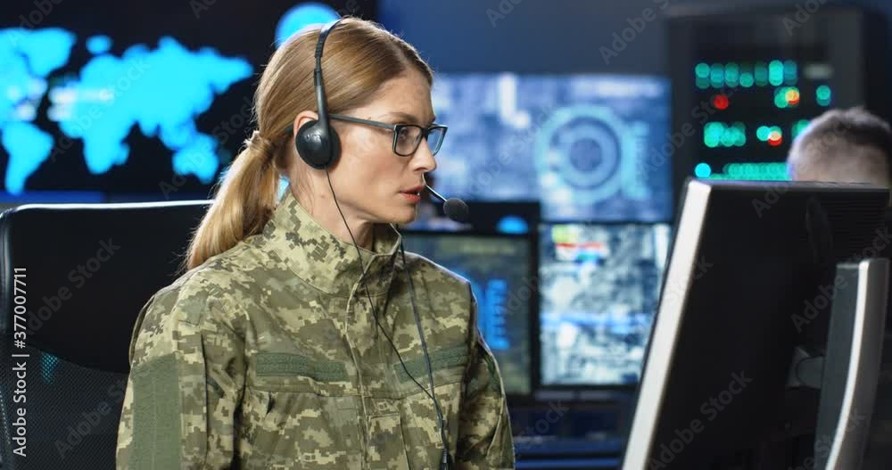 Vídeo do Stock: Caucasian female army officer in glasses and headset ...
