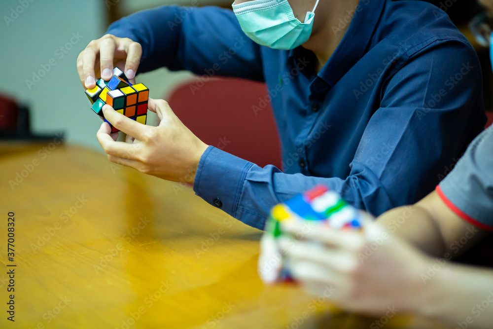 Bangkok, Thailand - September 9, 2020 : Business man holding Rubik's cube - technical and ...