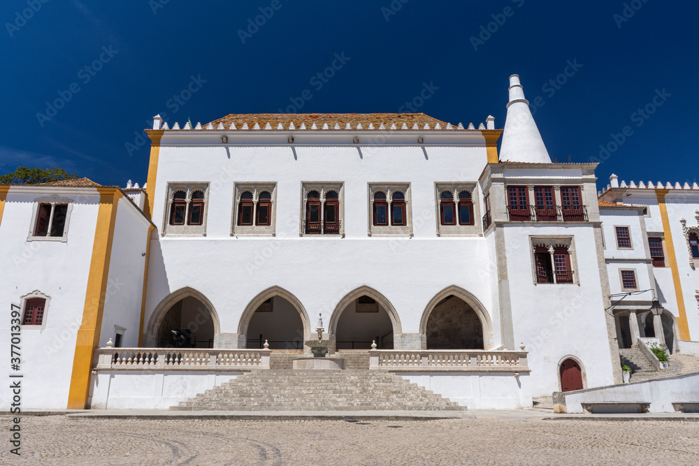 Beautiful view to old historic Sintra National Palace with white tower ...