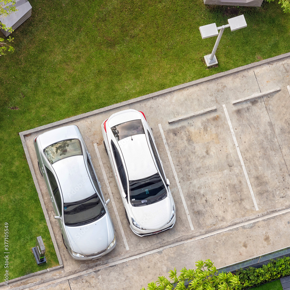 Top view of parking area with small garden in modern building Stock ...