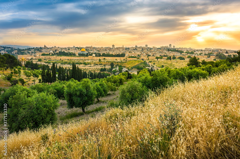 Beautiful sunset clouds over the Old City Jerusalem with Dome of the ...