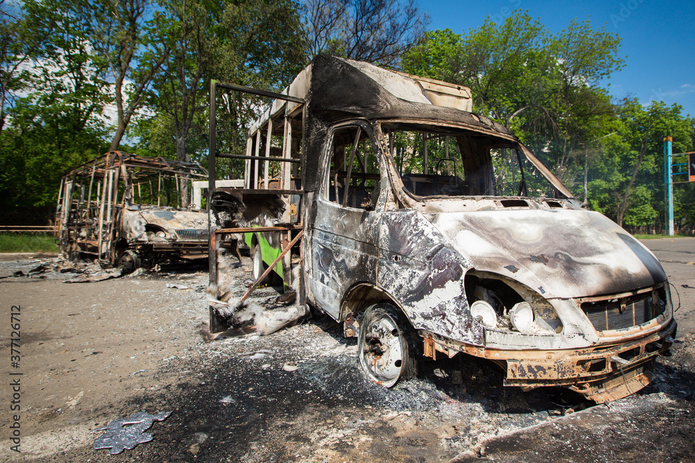 Burnt bus. War in Donbass. Eastern Ukraine. Stock Photo | Adobe Stock