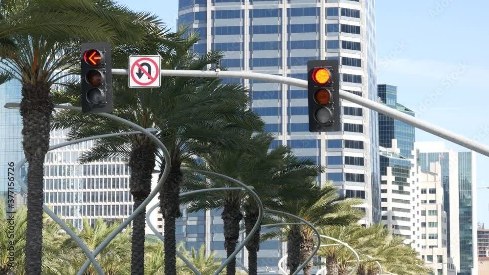 Traffic light and caution sign, road intersection in USA ...
