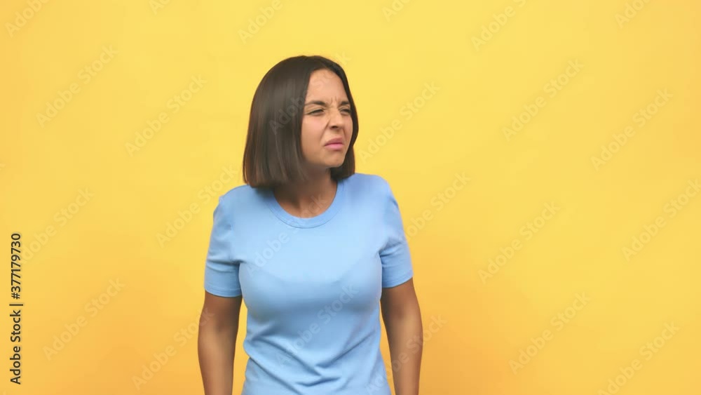 Young indian woman confused and doubtful, decide between two options ...