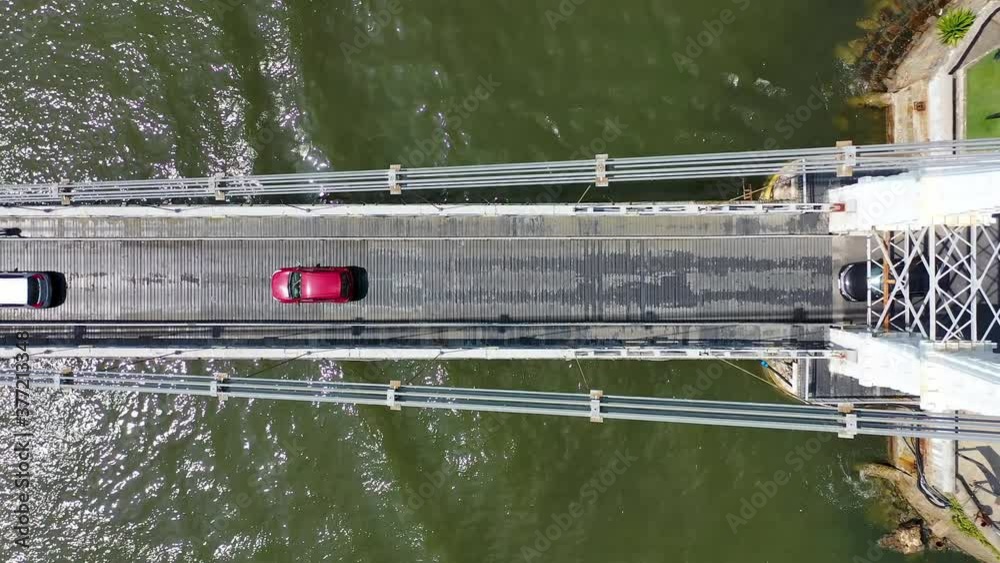 Suspension bridge above river view in Sao Vicente, Sao Paulo city ...