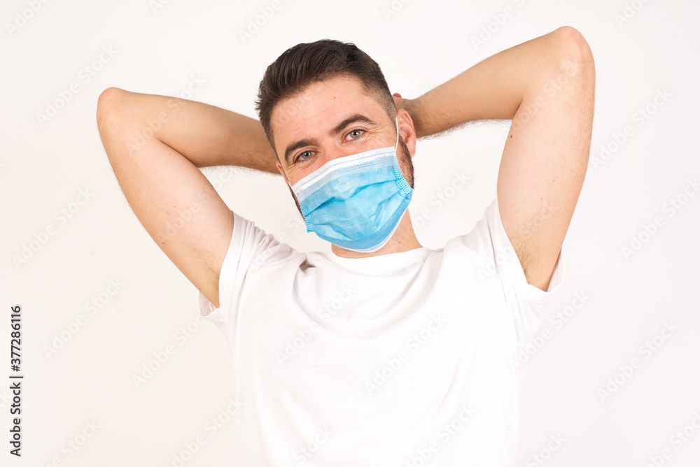 Portrait of handsome caucasian male looks with excitement at camera ...