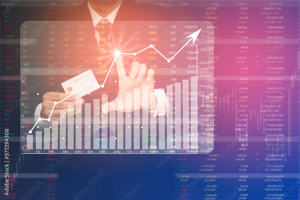 Businessman touch line arrow on the graph chart of stock market ...