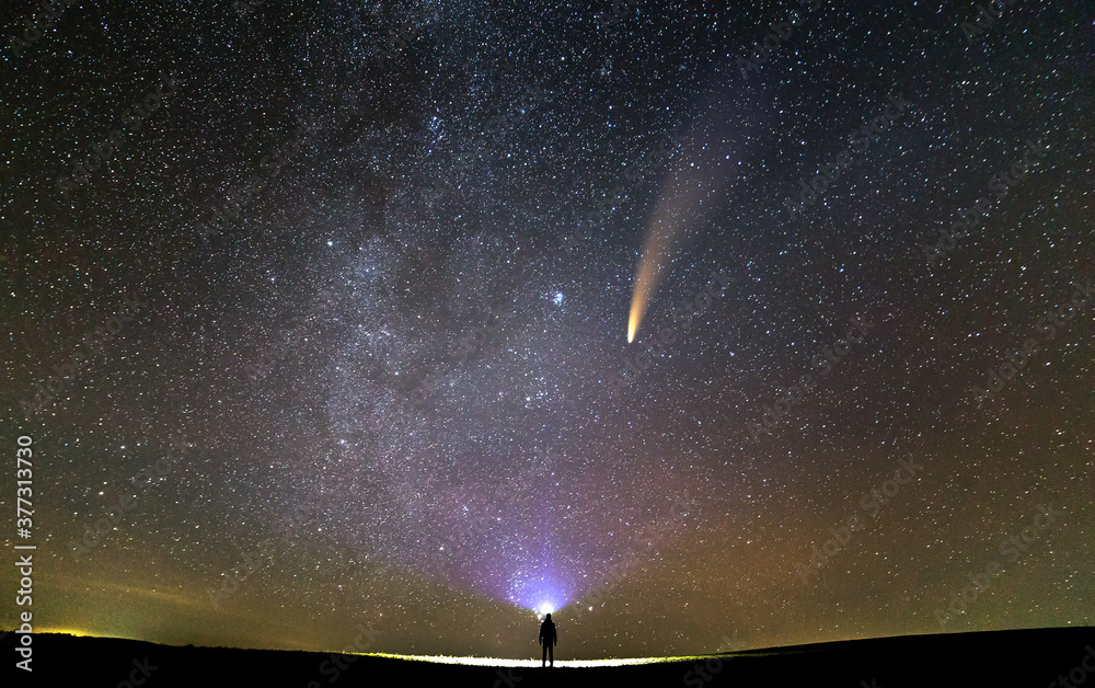 Fotografia do Stock: Small silhouette of a scientist with flashlight on ...