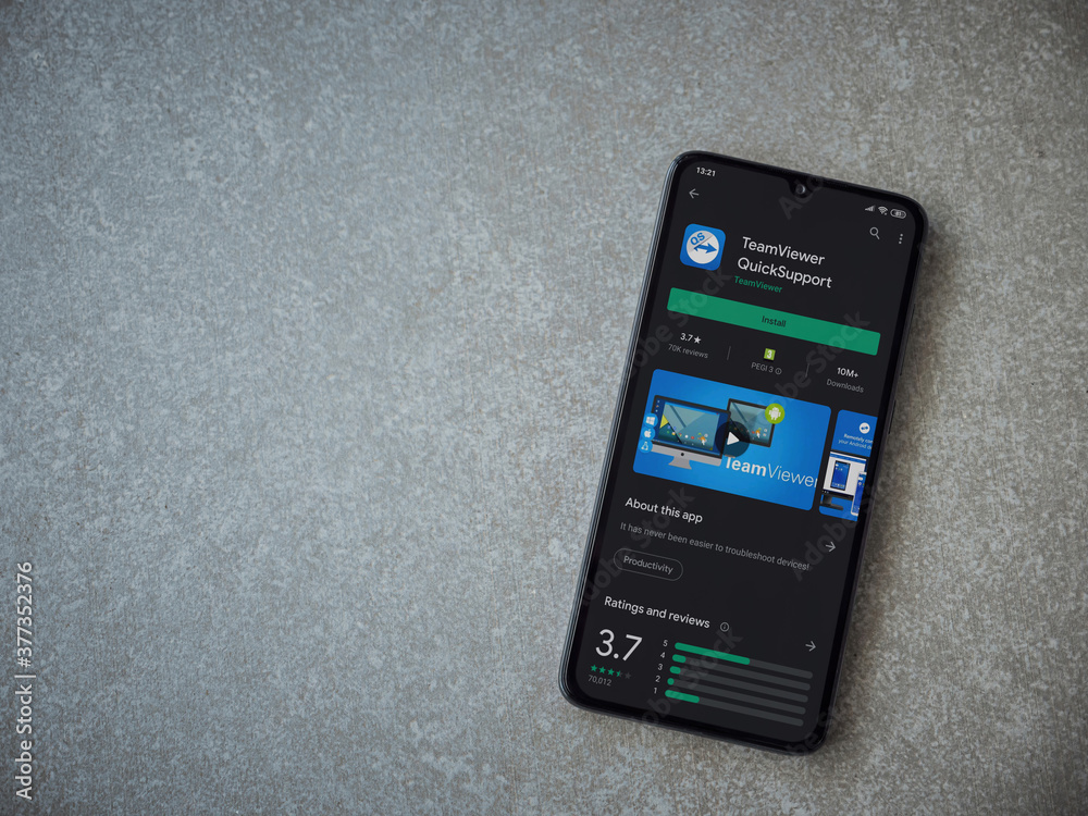 TeamViewer QuickSupport app play store page on the display of a black ...