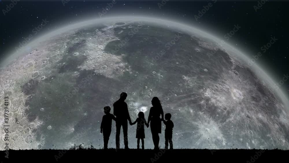 A Silhouette of a Family Watching on the Slowly Spinning Moon Around of ...
