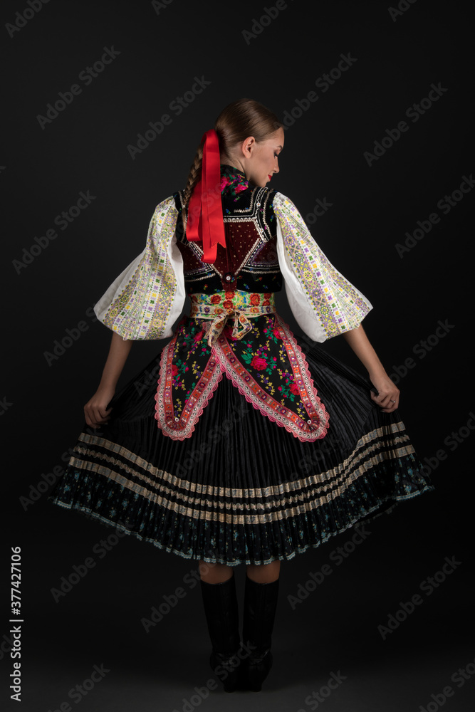 Beautiful woman wearing traditional Eastern Europe folk costumes ...
