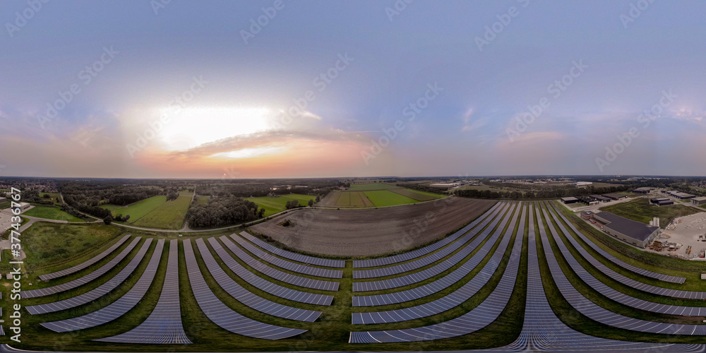 Foto de 360 degrees aerial panoramic view of solar panel station with ...