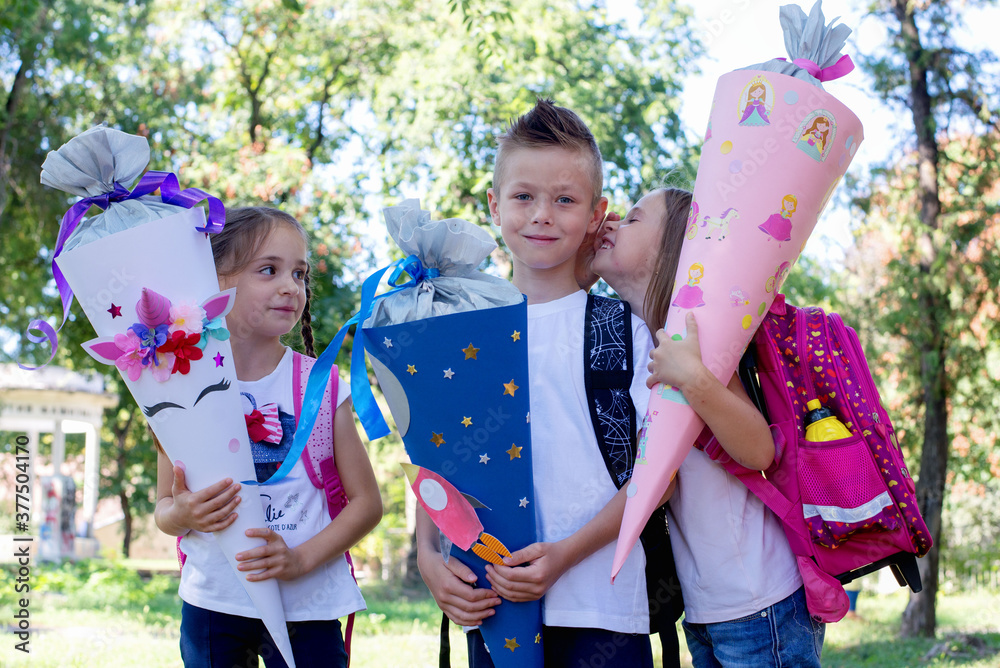Children with School cone in their hands. First day of school Stock ...