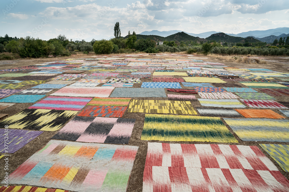 Carpet, Rugs fields. Handmade carpet color withering process in a large ...