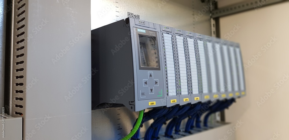 Siemens Simatic PLC controller in control cabinet Stock Photo | Adobe Stock