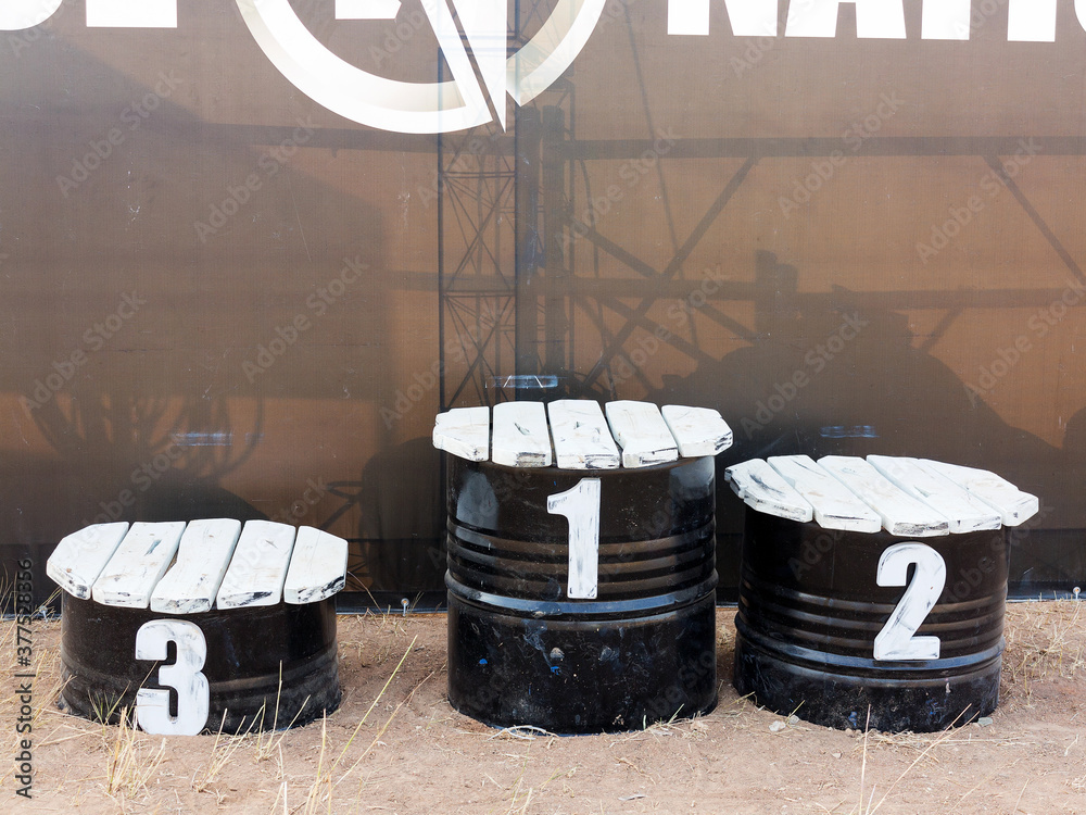 Winner podium made from metal cans. Competition pedestal. An improvised ...