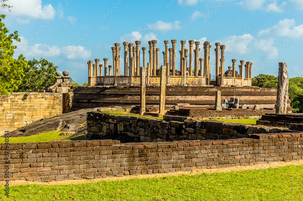 A view across the ancient stupa ruins in the Medirigiriya Vatadage in ...