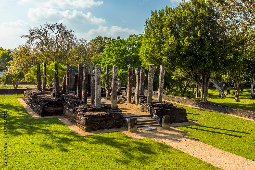 The view of a small ancient stupa in the Medirigiriya Vatadage in Sri ...